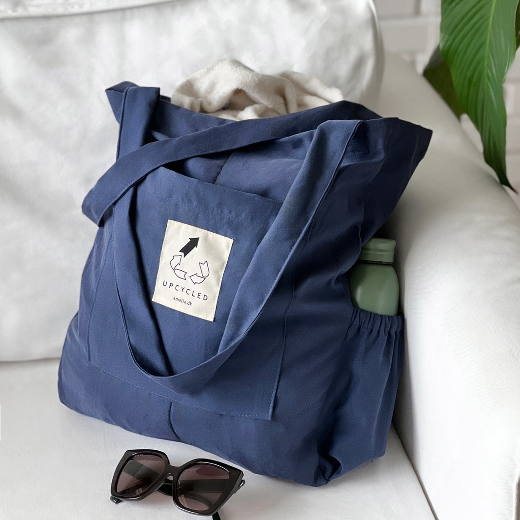 Amolia - Upcycled textiles and recycled furniture from Denmark